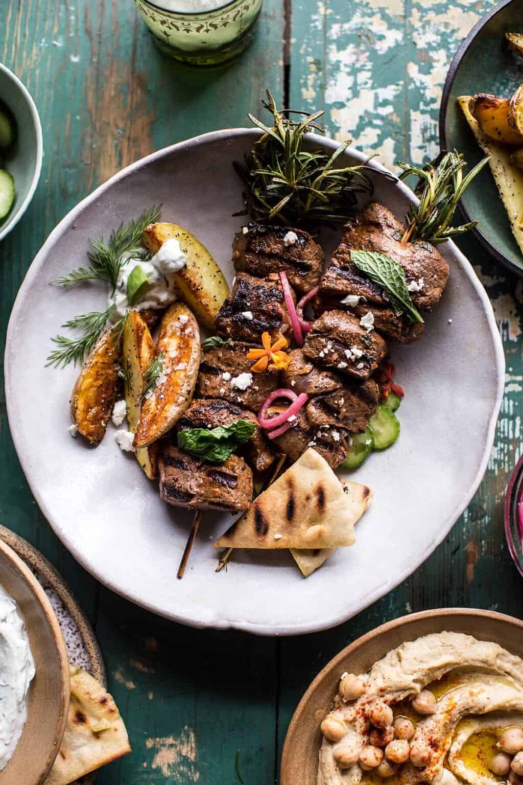Greek Lamb Souvlaki Plates with Avocado Tzatziki. - Half Baked Harvest