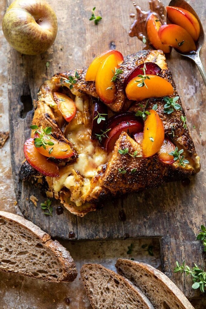 Pastry Wrapped Baked Brie with Thyme Butter Roasted Plums. - Half Baked ...