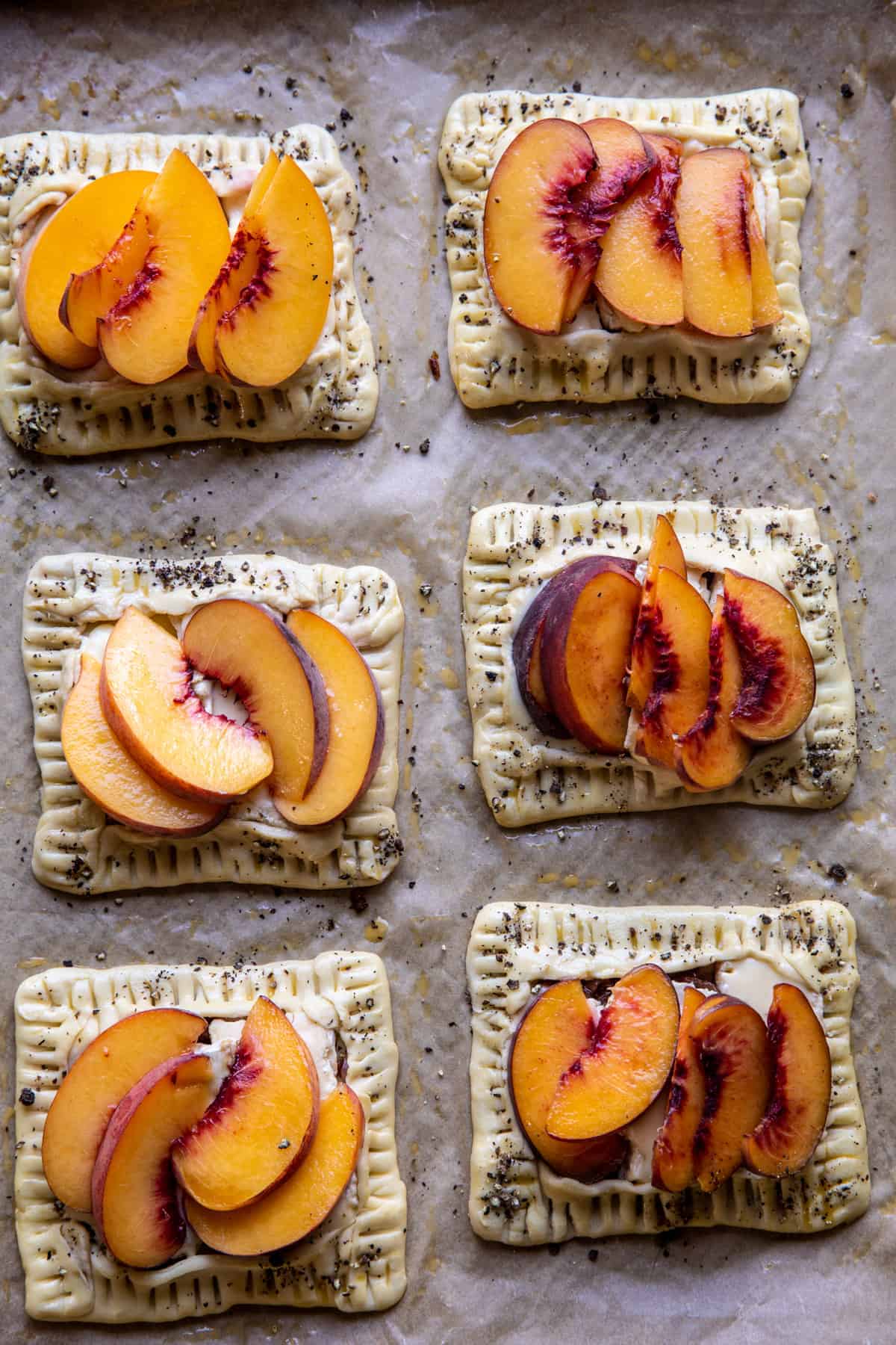 Peach Brie Pastry Tarts with Peppered Rosemary Honey. - Half Baked Harvest