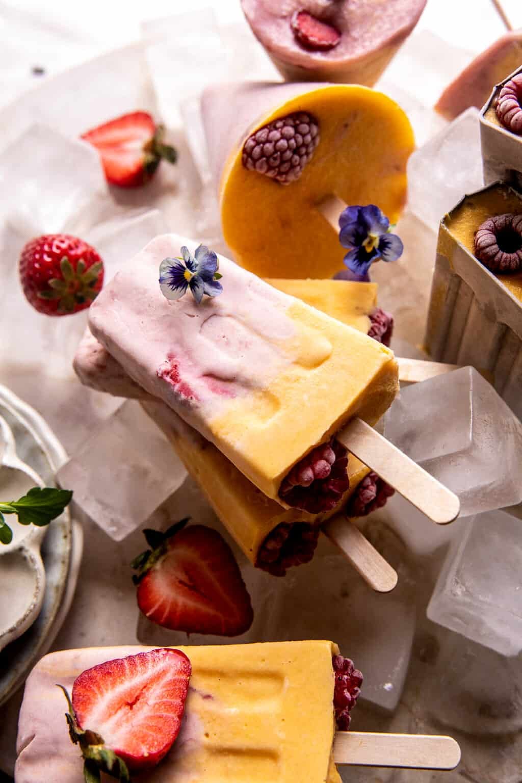 Creamy Strawberry Mango Popsicles. - Half Baked Harvest
