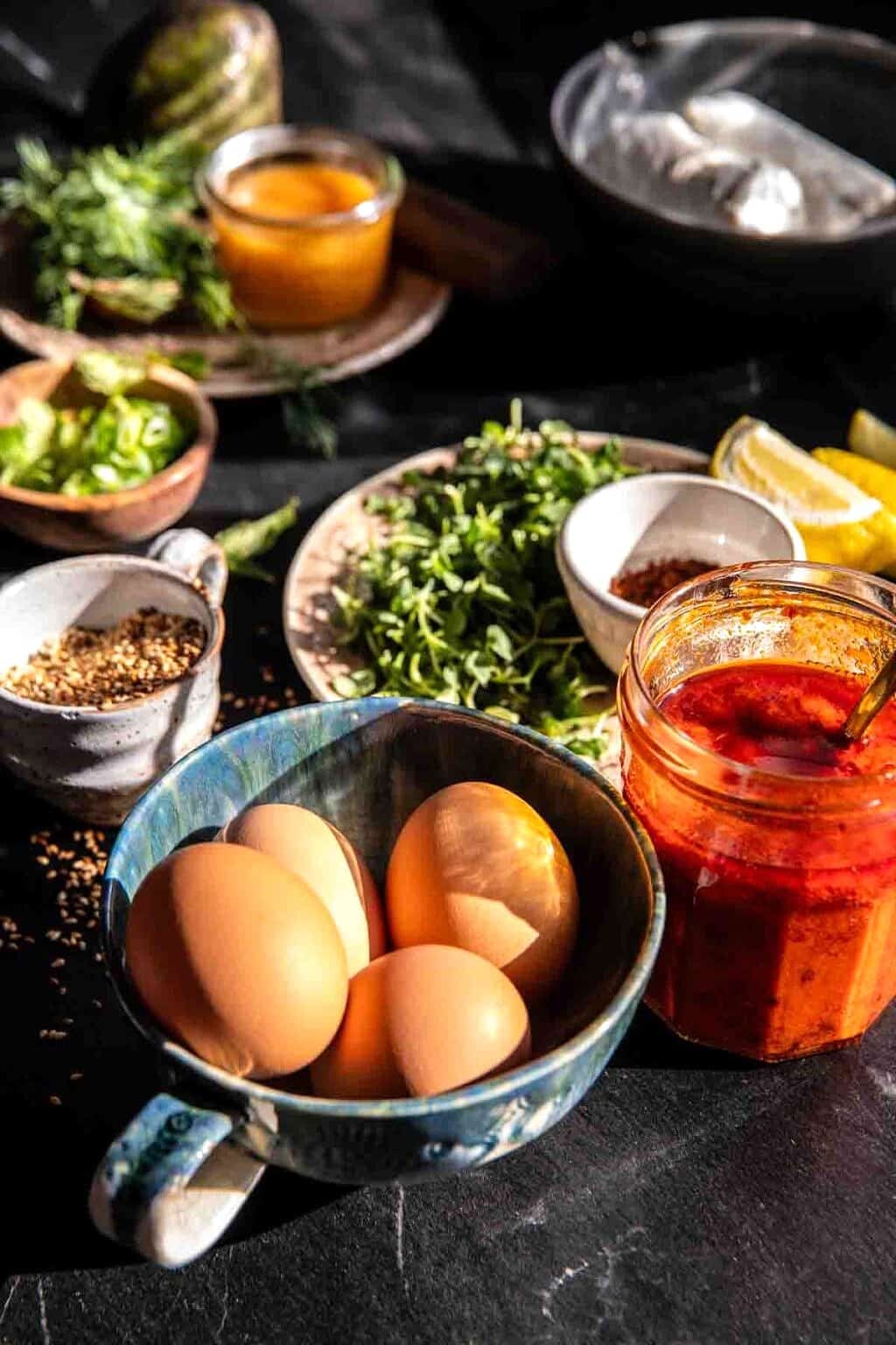 Harissa Eggs in Whipped Goat Cheese. - Half Baked Harvest
