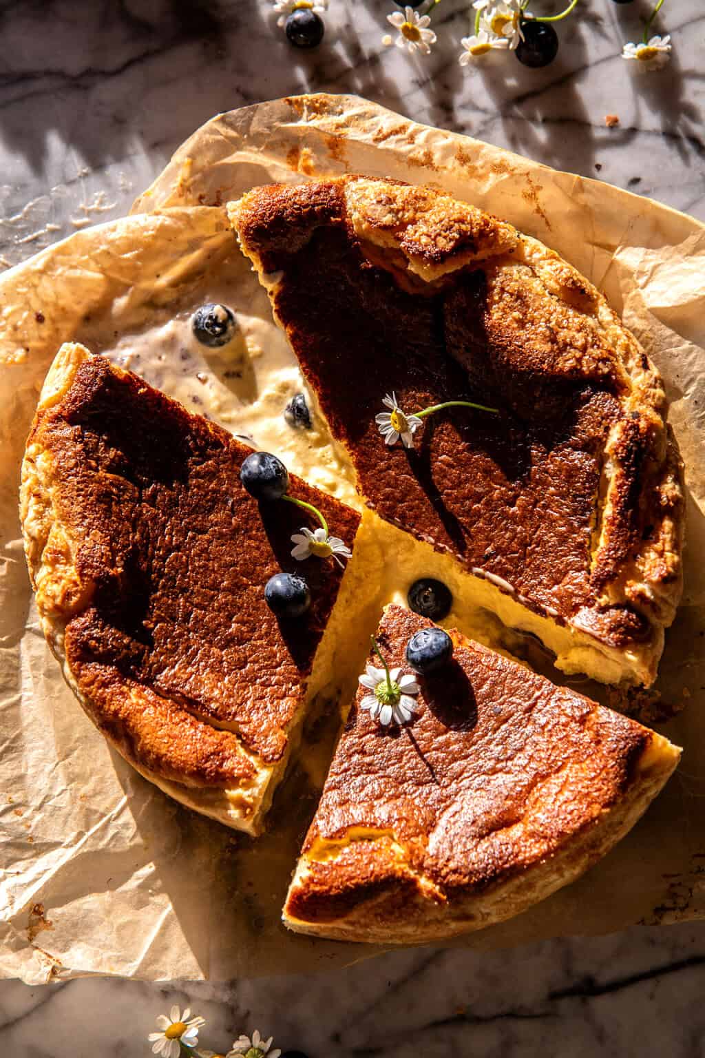 Custardy Burnt Basque Blueberry Cheesecake. - Half Baked Harvest